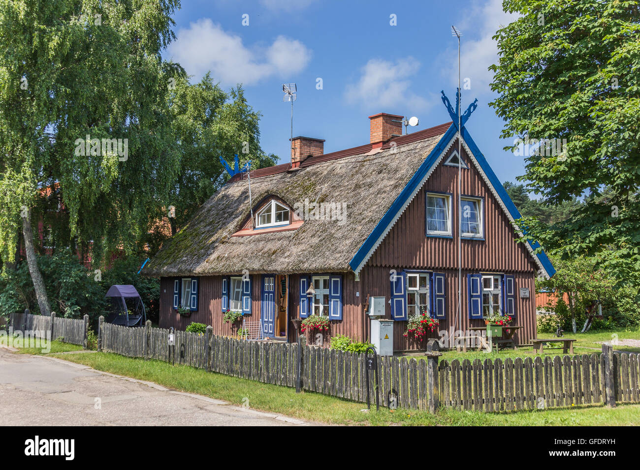 Traditional wooden house on the peninsula of Curonian Spit, Lithuania ...