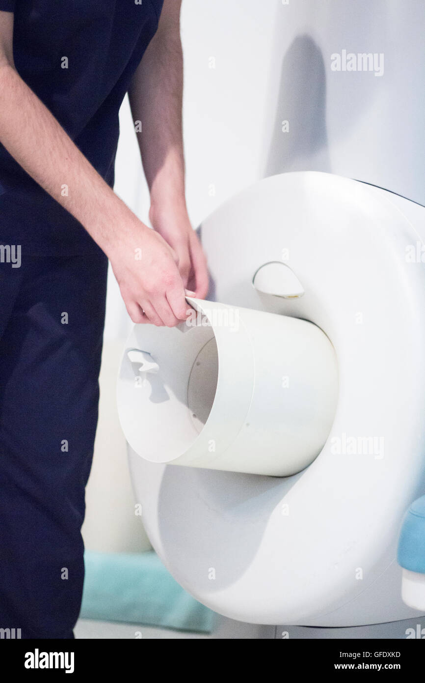 Magnetic resonance imaging totally open MRI scanner and technician in ...