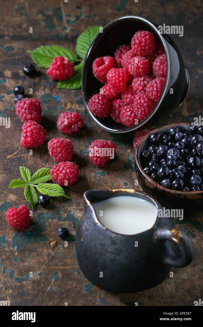 Bowls of raspberries and blueberries Stock Photo - Alamy