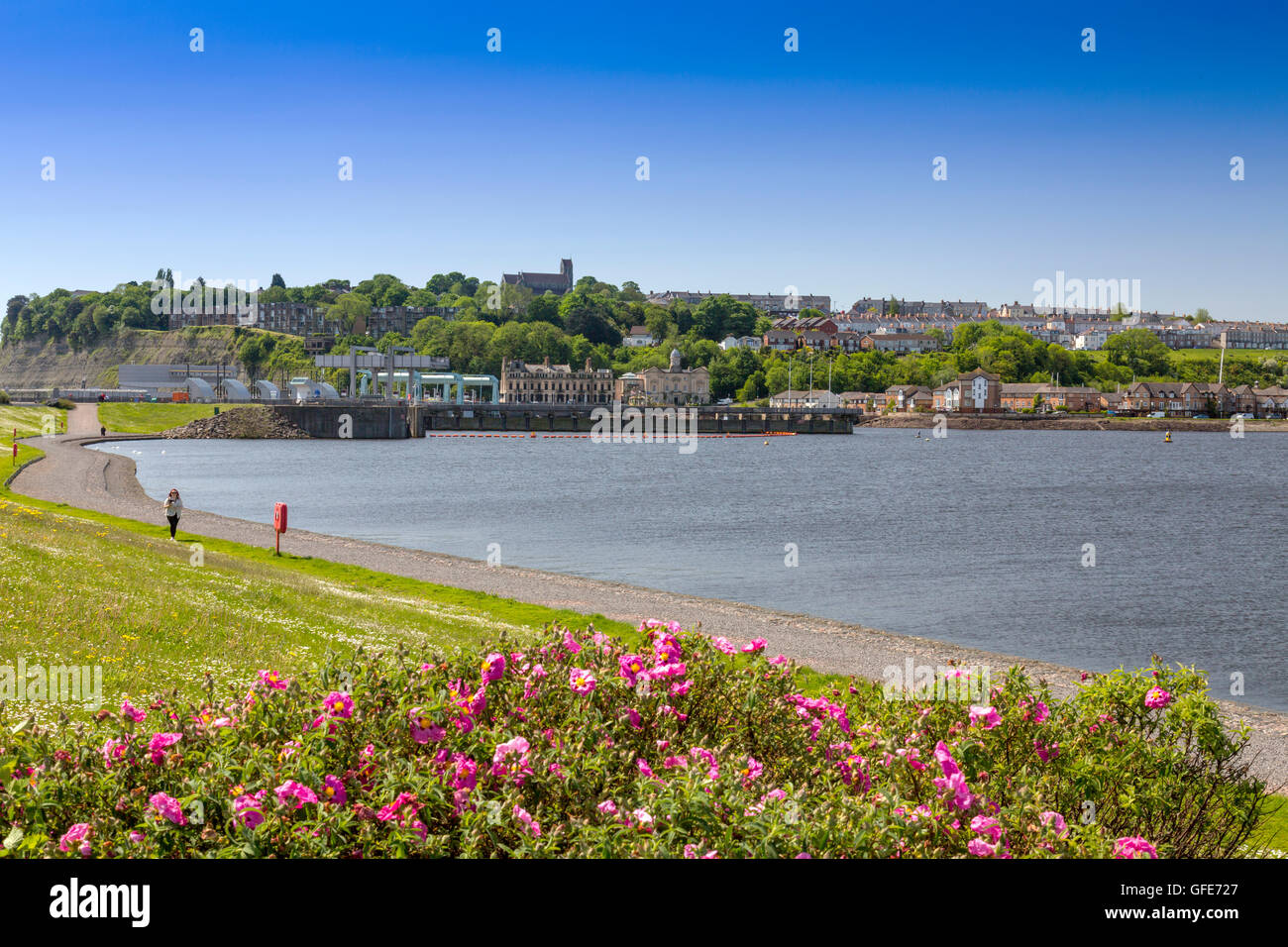 The historic port of Penarth and the tidal barrage in Cardiff Bay ...