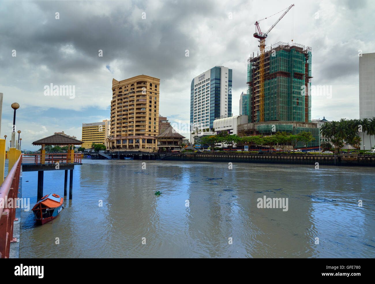 View of Kuching city waterfront and Sarawak river with traditional ...