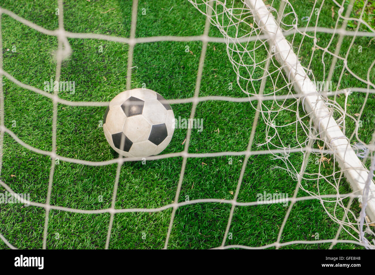 soccer ball in goal Stock Photo - Alamy