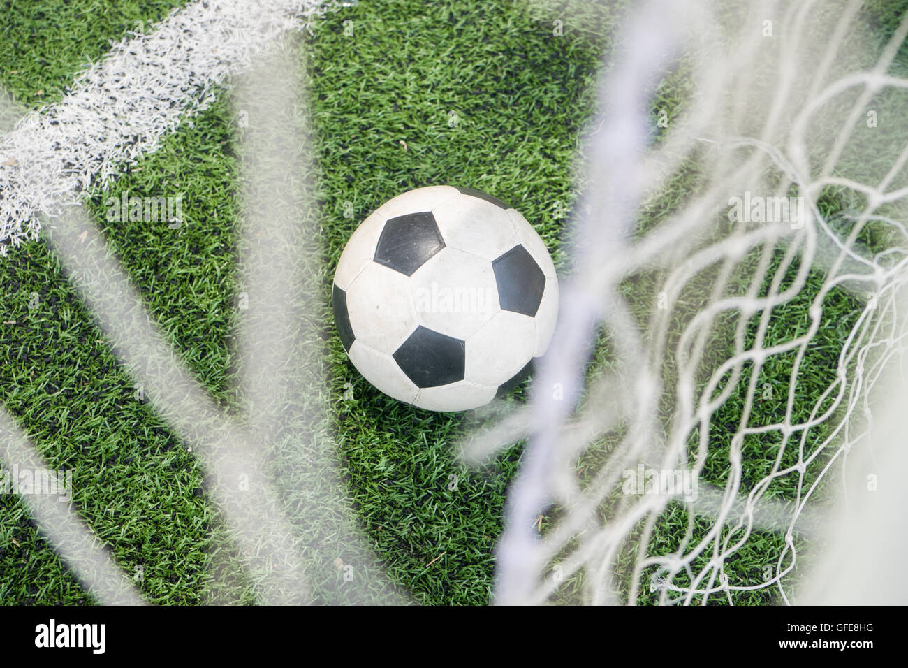 soccer ball in goal Stock Photo - Alamy