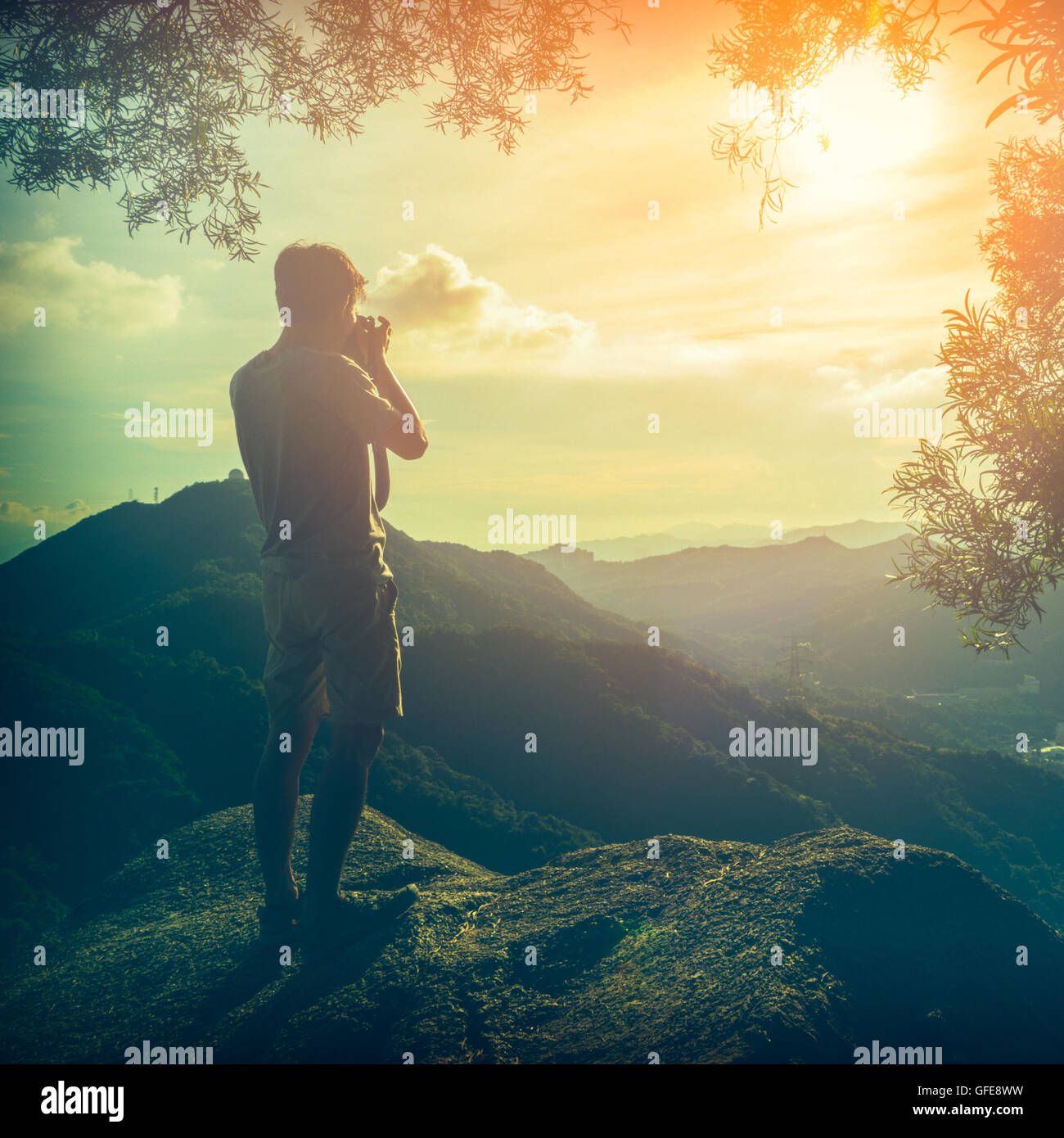 Man Traveler with photo camera outdoor Travel Lifestyle survival ...