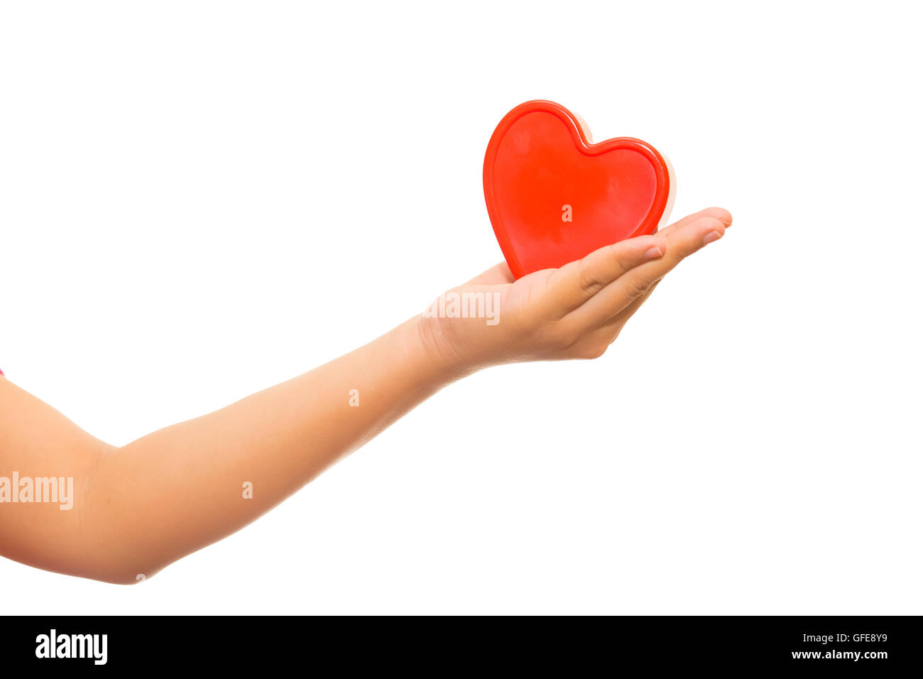 Heart in the hands isolated Stock Photo - Alamy