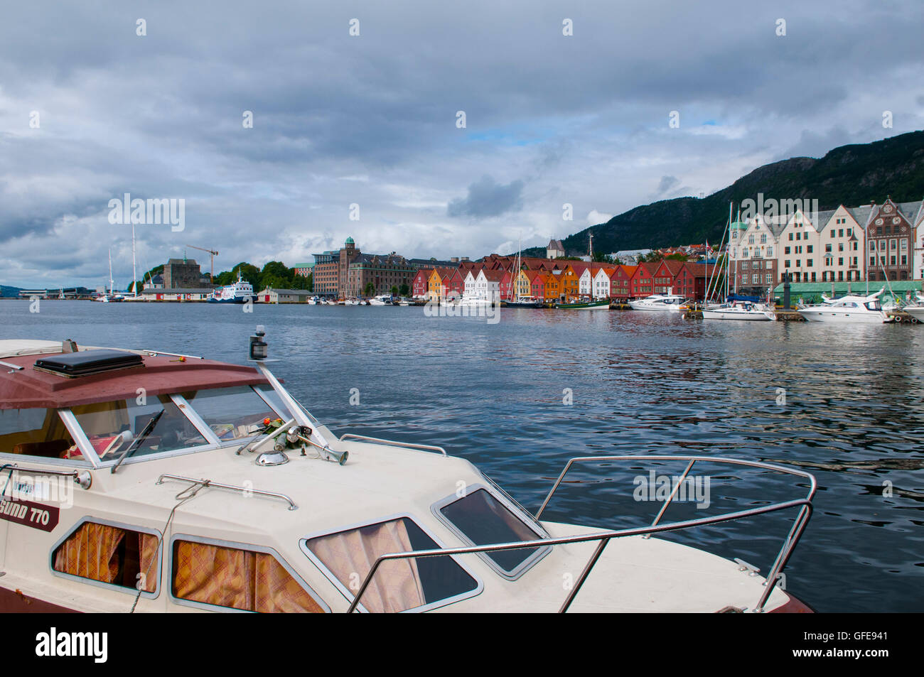 Bergen, Norway. The waterfront with the red wooden Bryggen Wharf across ...