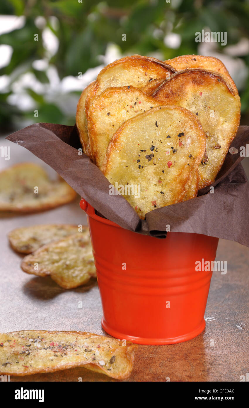 Potato chips in bucket hi-res stock photography and images - Alamy