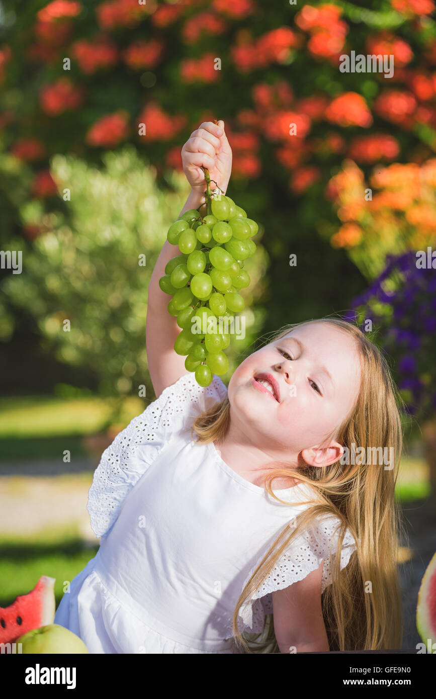 Happy girl eating healthy food hi-res stock photography and images - Alamy
