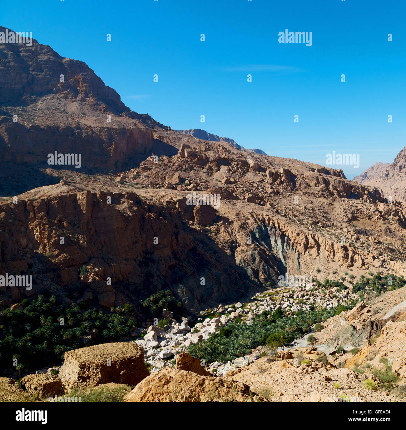 gorge and canyon the deep cloudy sky in oman the old mountain Stock ...