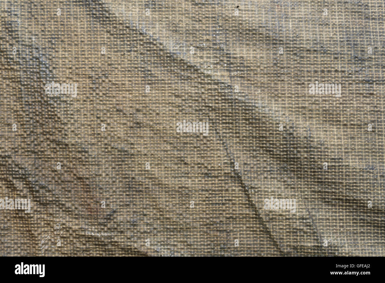 Close-up of window shutter material of an old canvas army field tent ...
