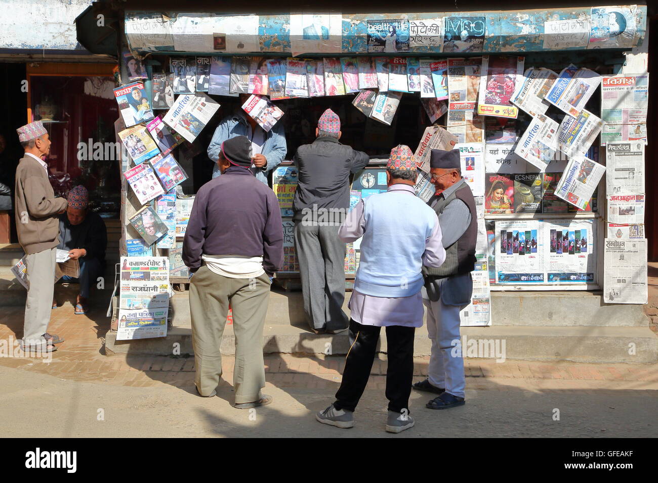 Nepalese men gathering and wearing Dhaka Topi (traditional Nepalese hat ...