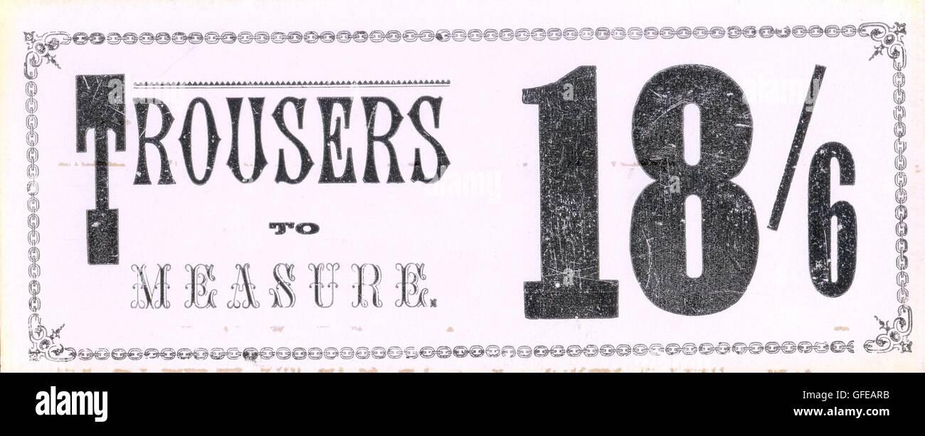 Window bill advertising made to measure trousers Stock Photo - Alamy