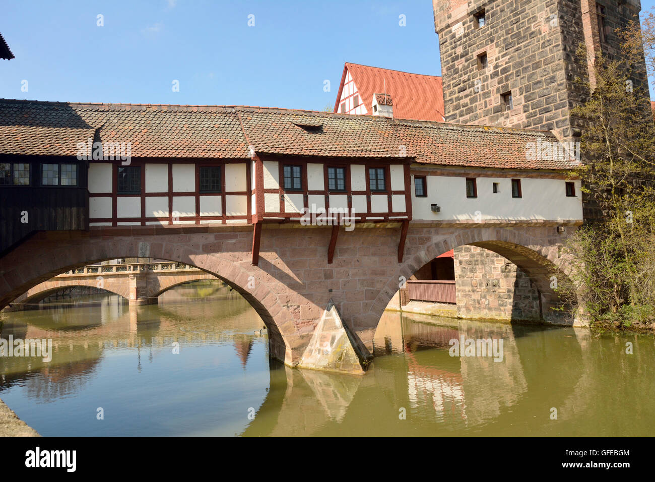 Covered Henkersteg bridge in Nuremberg Stock Photo - Alamy