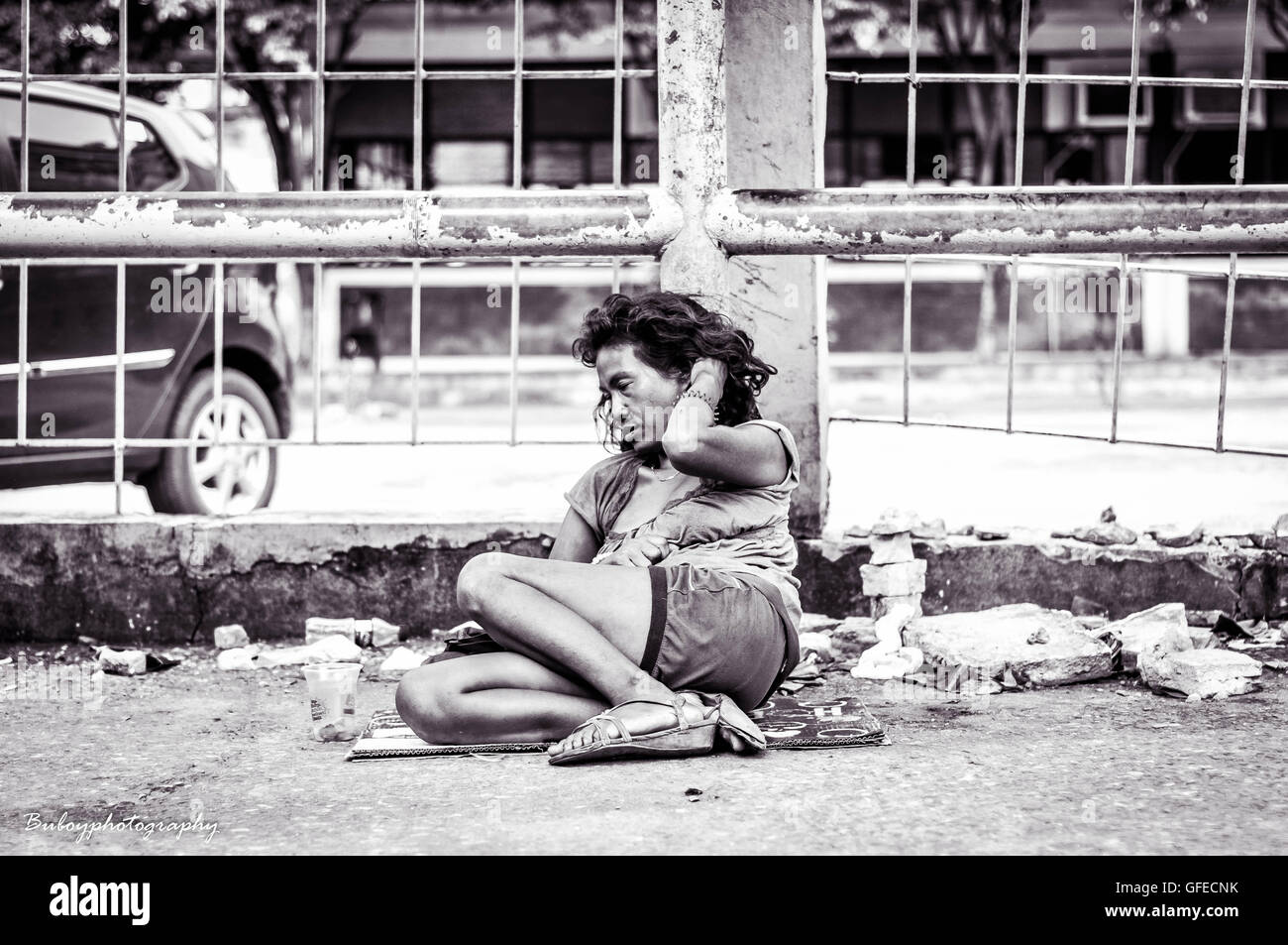 homeless woman begging on the street Stock Photo - Alamy