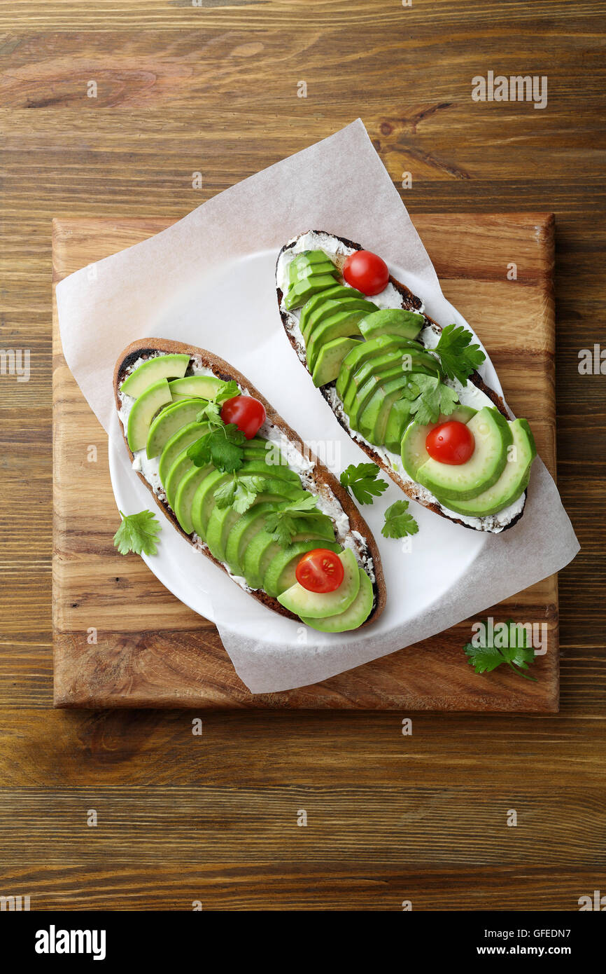healthy sandwich with avocado, food top view Stock Photo - Alamy