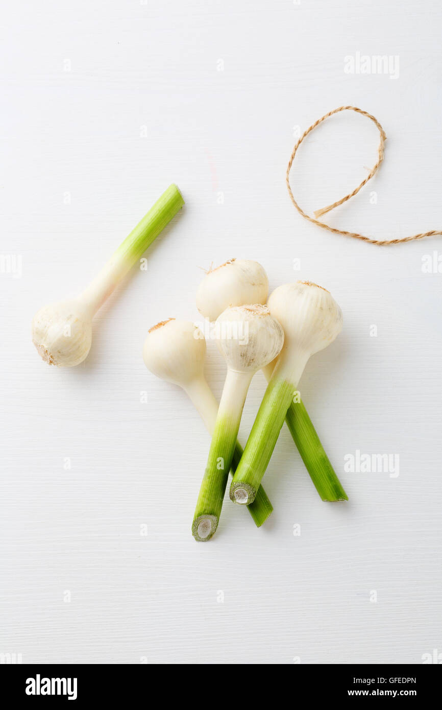 fresh garlic on white background, food top view Stock Photo - Alamy