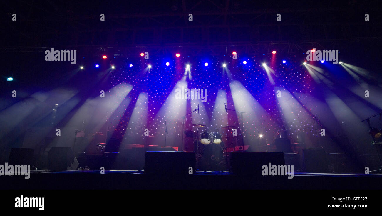 Coloured stage lights and smoke as a vivid colour background Stock ...