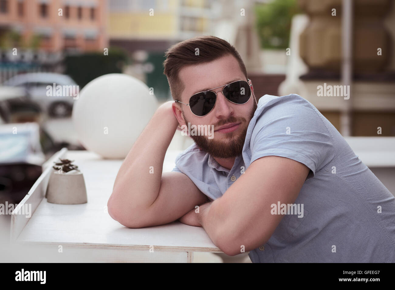 Handsome man in city centre Stock Photo - Alamy