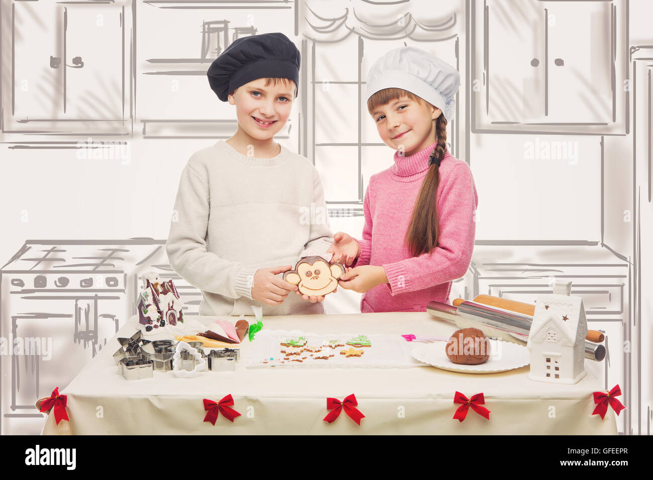 Beautiful boy and girl in chef hats making christmas cookies. Children ...