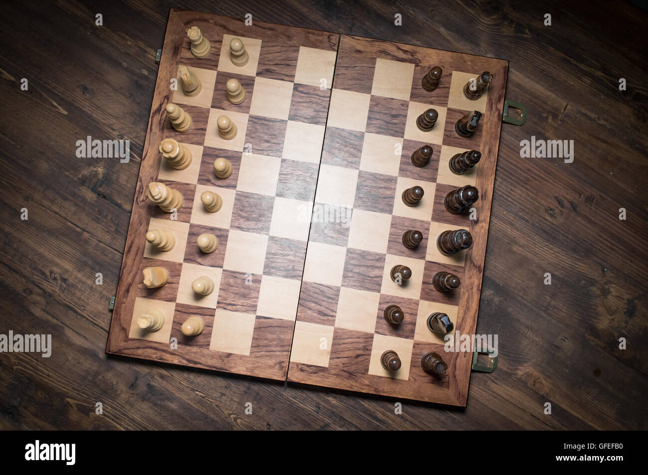 Chess pieces and board set up for beginning of game Stock Photo - Alamy