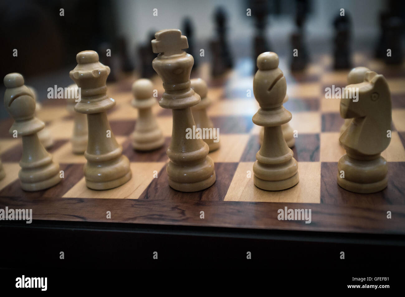 Chess pieces and board set up for beginning of game Stock Photo - Alamy
