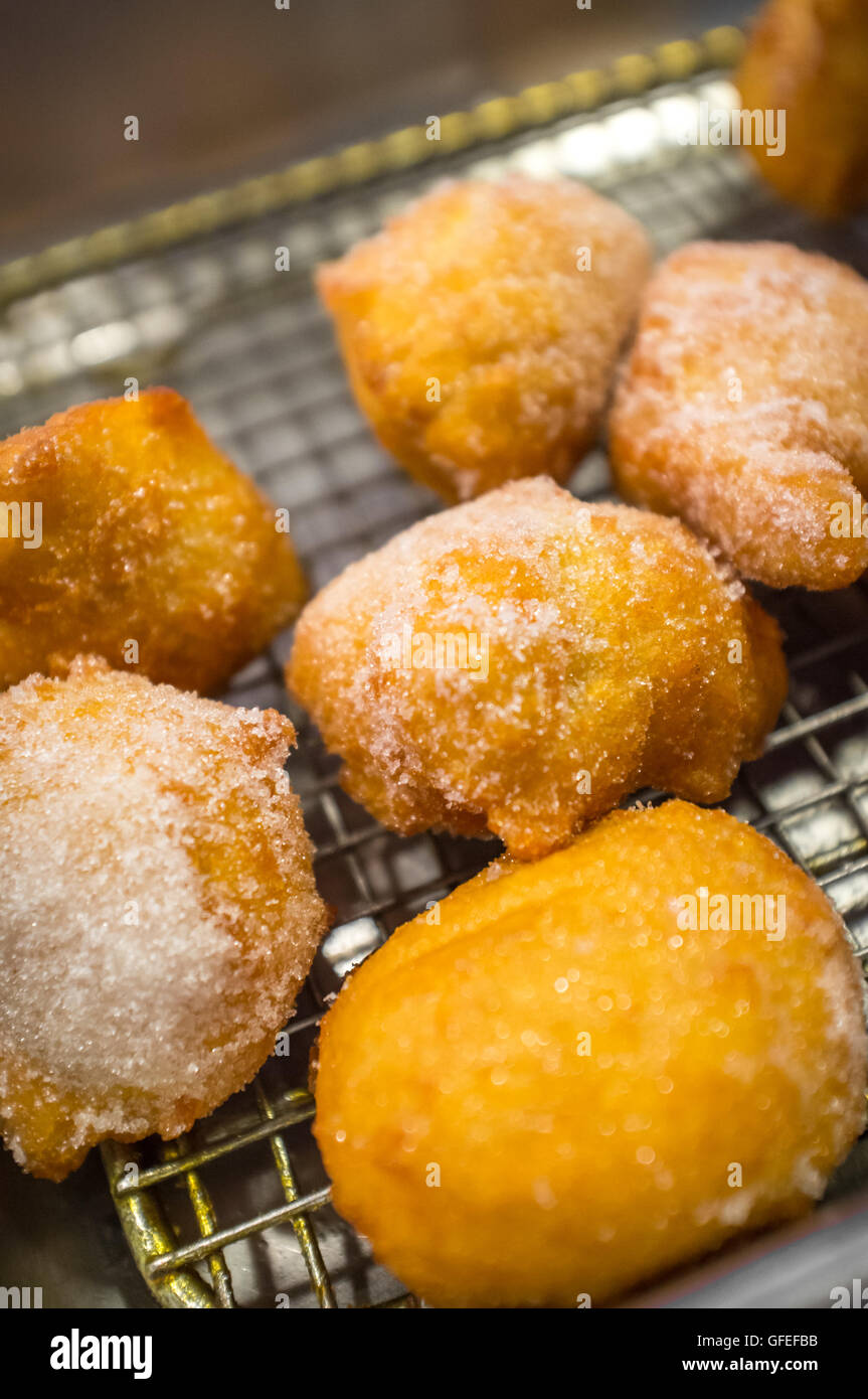 Fried sweet Chinese doughnuts on buffet server tray Stock Photo - Alamy