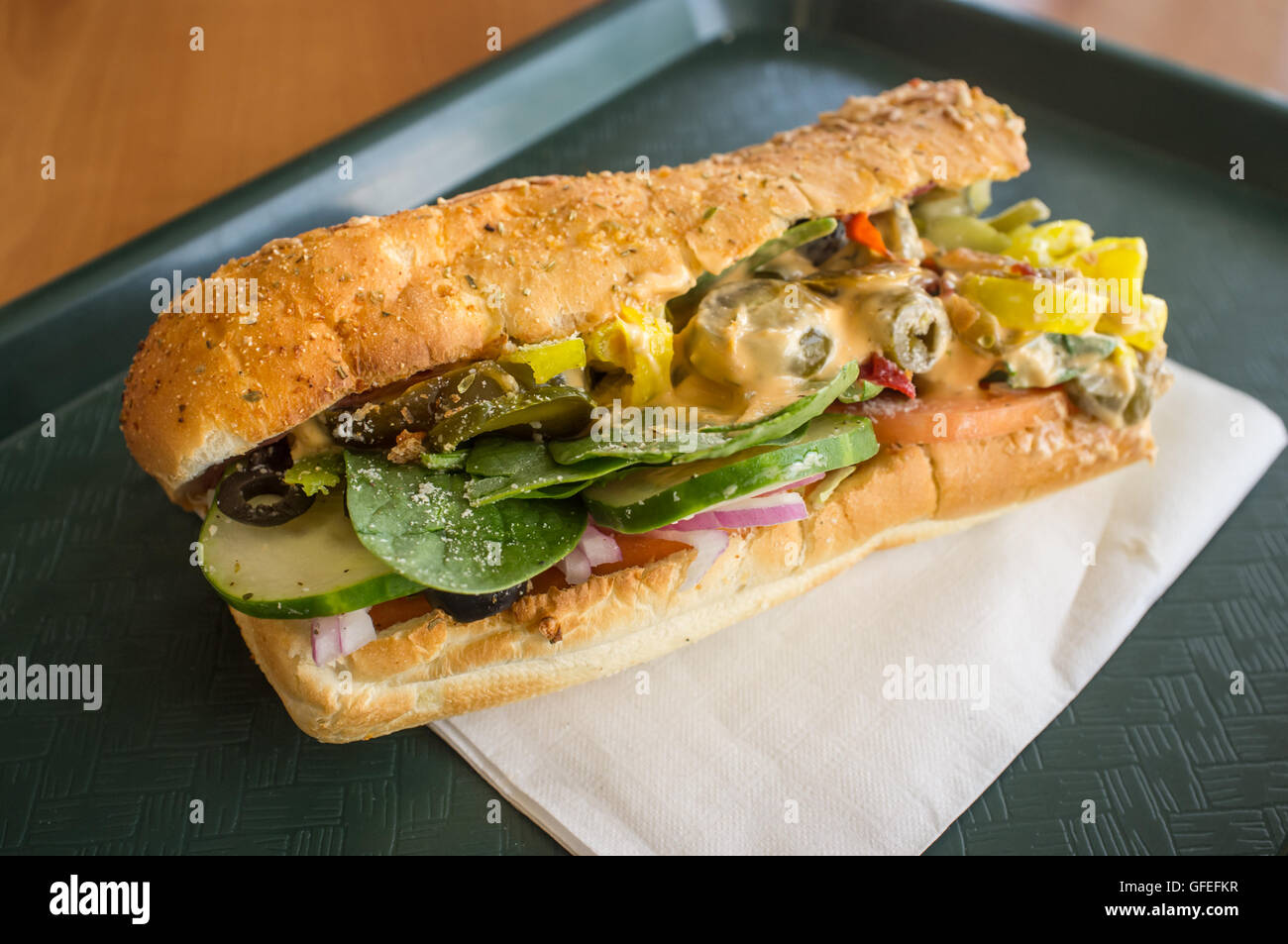 Stuffed overflowing huge spicy sub sandwich with every topping Stock ...