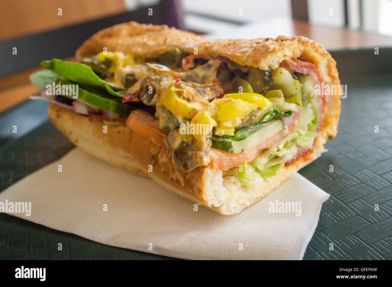 Stuffed overflowing huge spicy sub sandwich with every topping Stock ...
