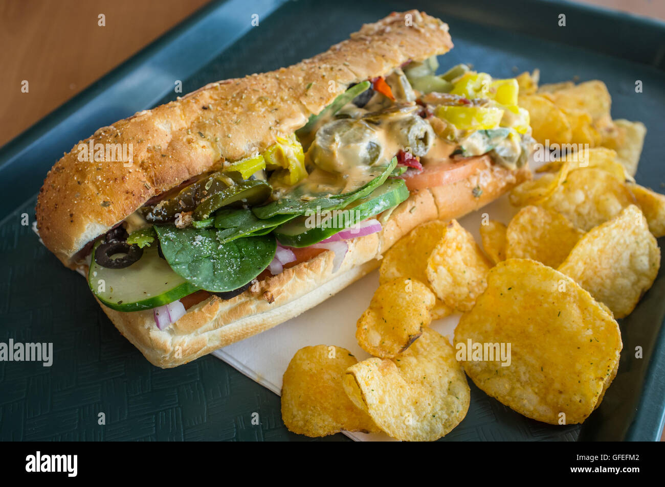 Stuffed overflowing huge spicy sub sandwich with every topping Stock ...