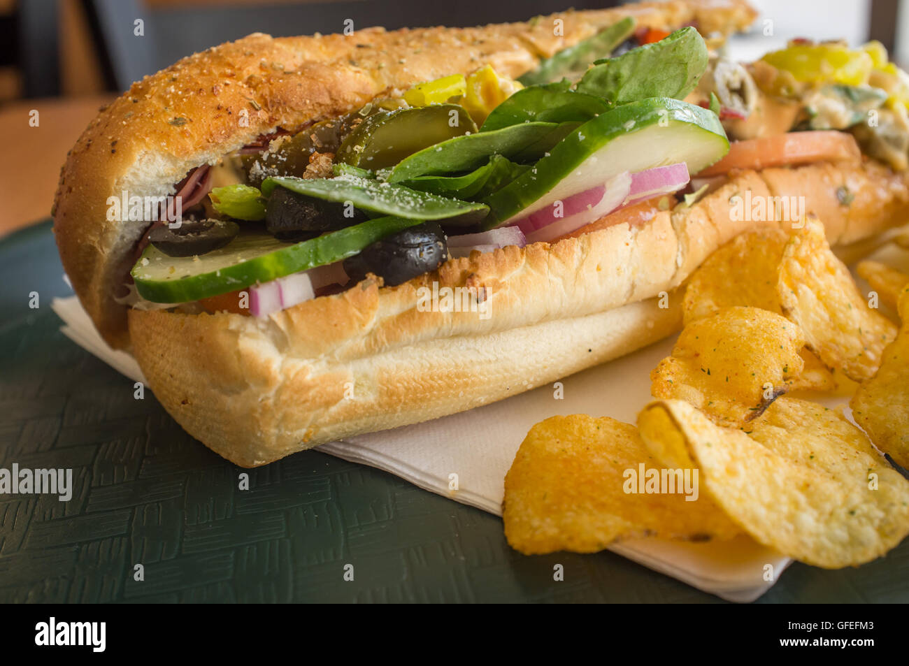 Stuffed overflowing huge spicy sub sandwich with every topping Stock ...