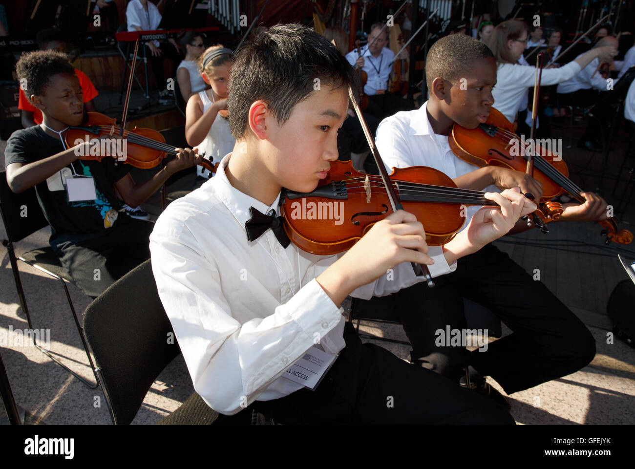 Young musician playing with the Boston Landmarks Orchestra at the Hatch ...