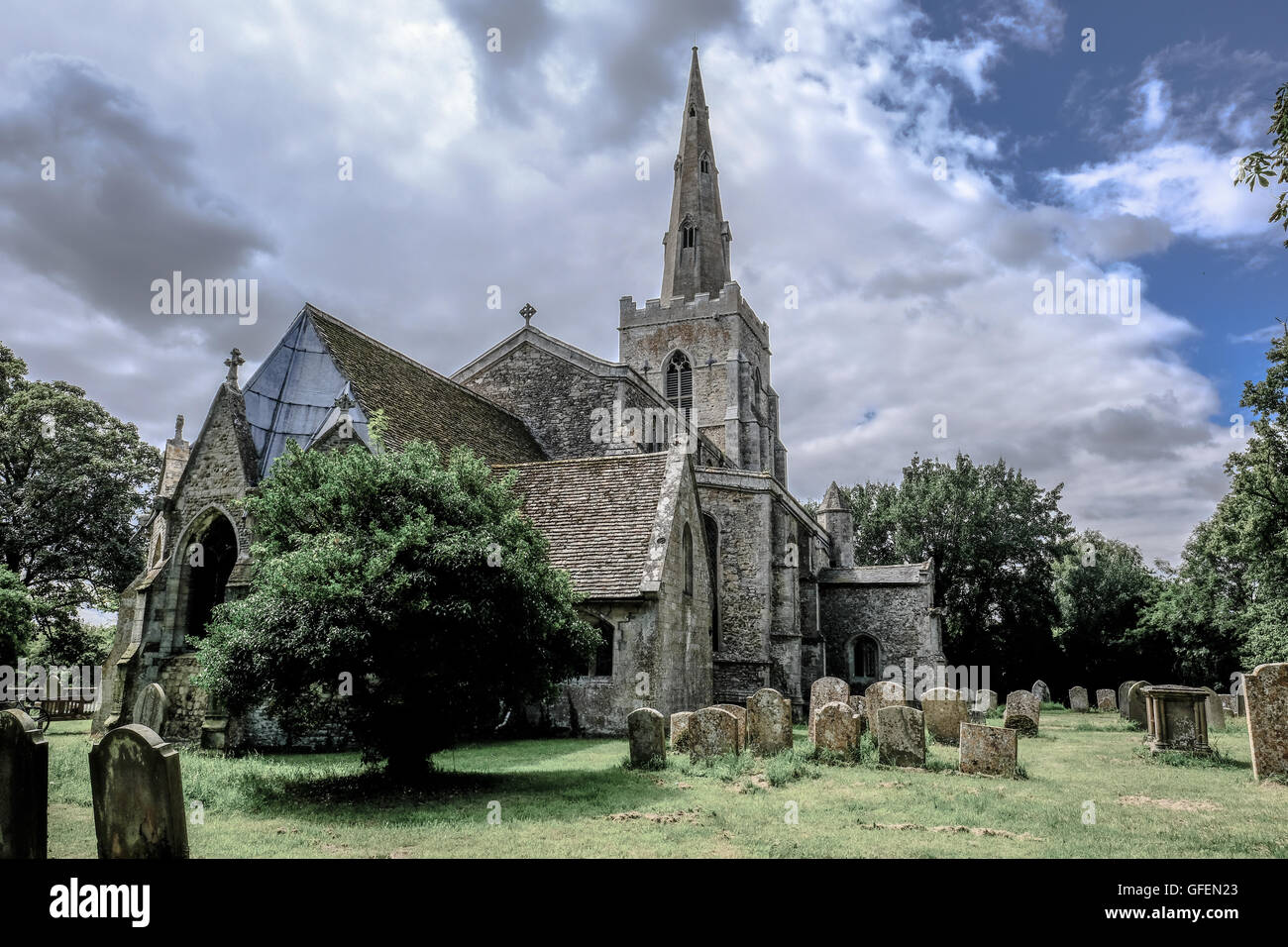 Classic view of an English Church and Churchyard set in a tranquil ...