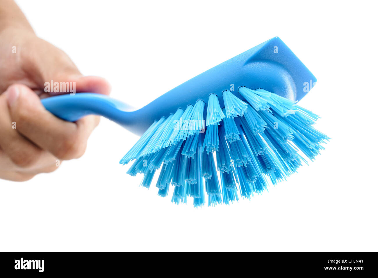 closeup blue plastic cleaning brush in hand Stock Photo - Alamy
