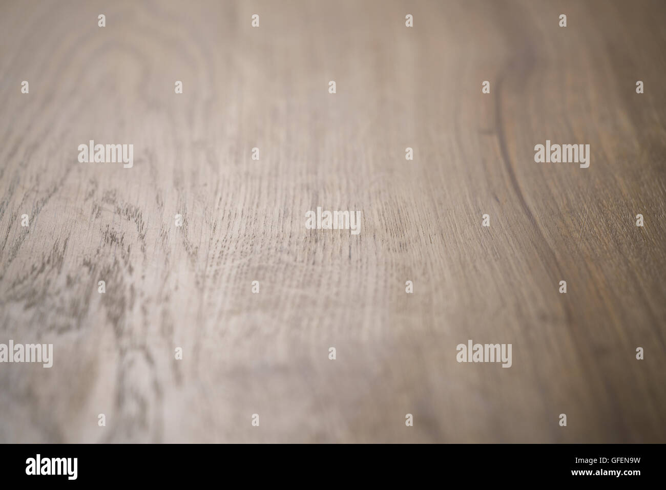 old stained oak wood table angle background Stock Photo - Alamy