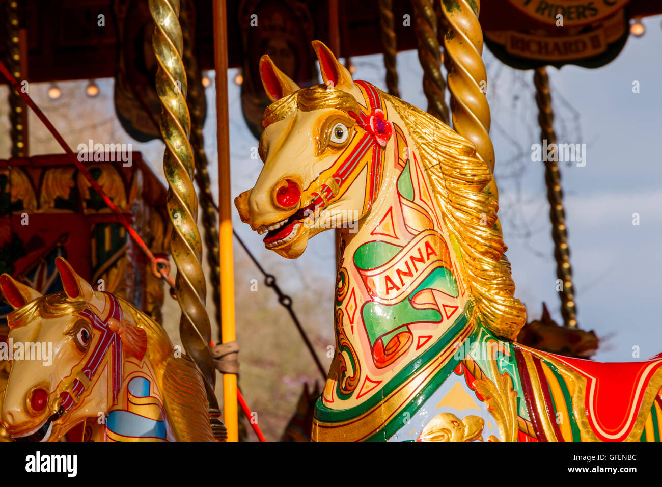 Children on a merry go round at a fun fair hi-res stock photography and ...