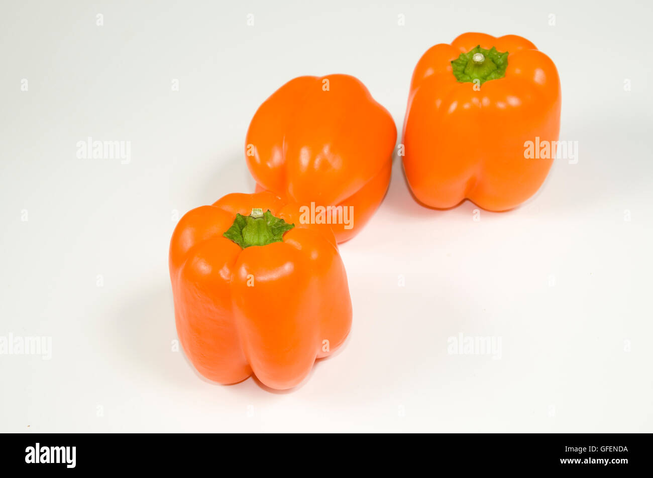 Orange Bell pepper (Capsicum annuum) on white background Stock Photo ...