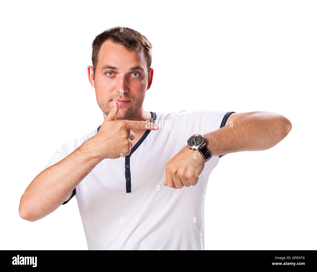 Worrier man running out of time looking his watch isolated on a white ...