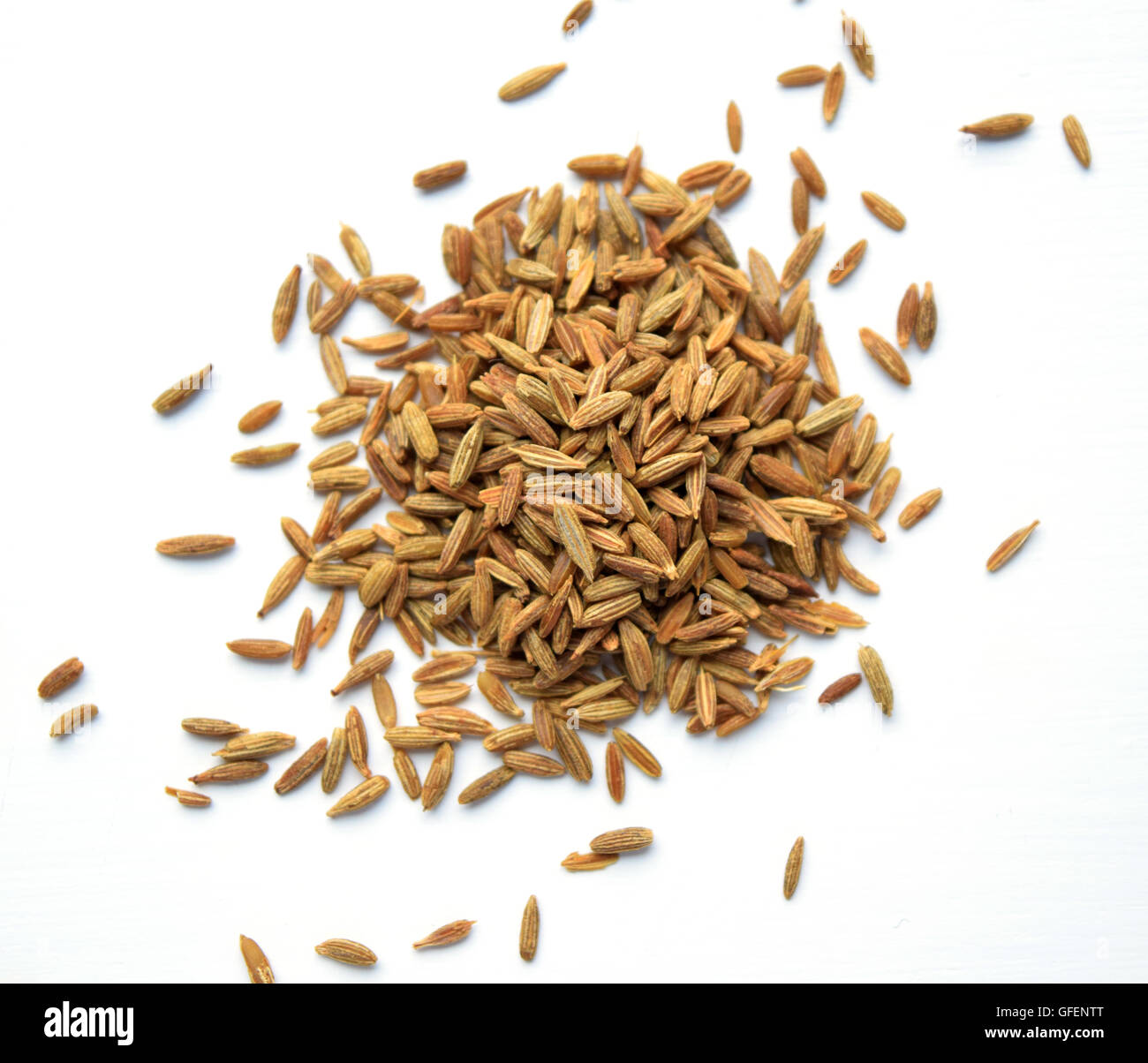 Cumin (cuminum cyminum from apiaceae family) in a pile, isolated on ...
