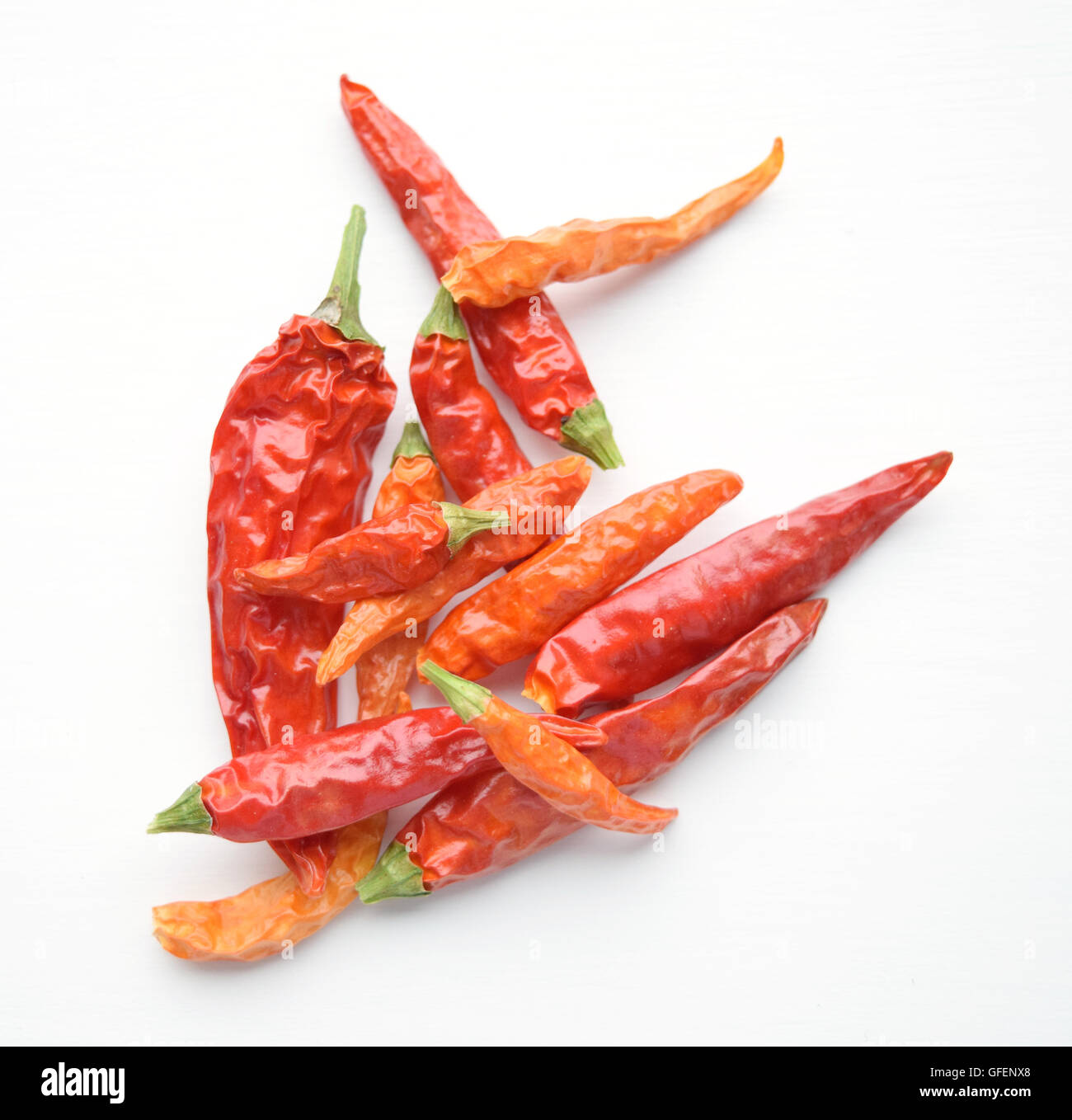 Dried red cayenne chili peppers - isolated Stock Photo - Alamy