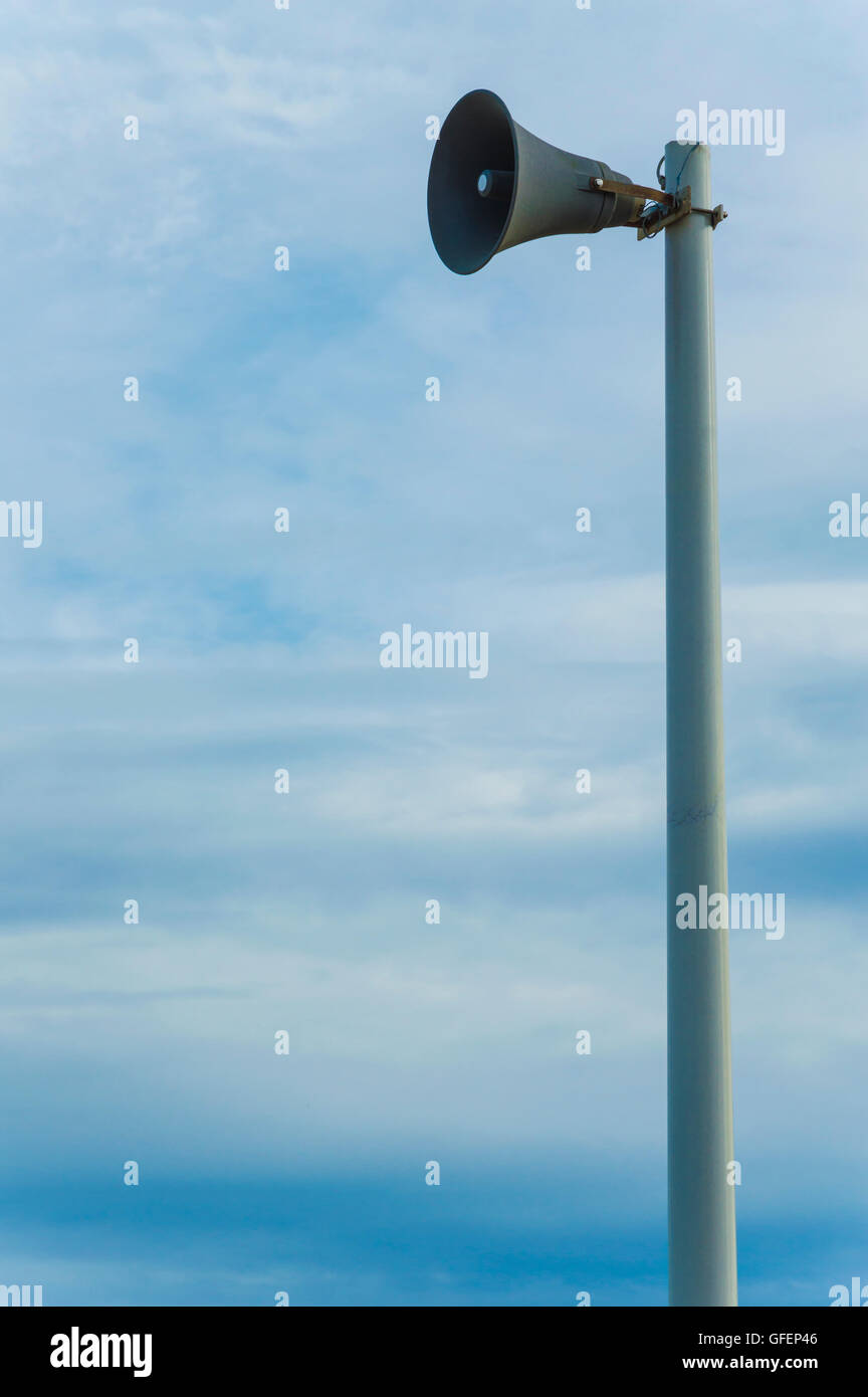 Isolated magaphone in a blue sky background Stock Photo - Alamy