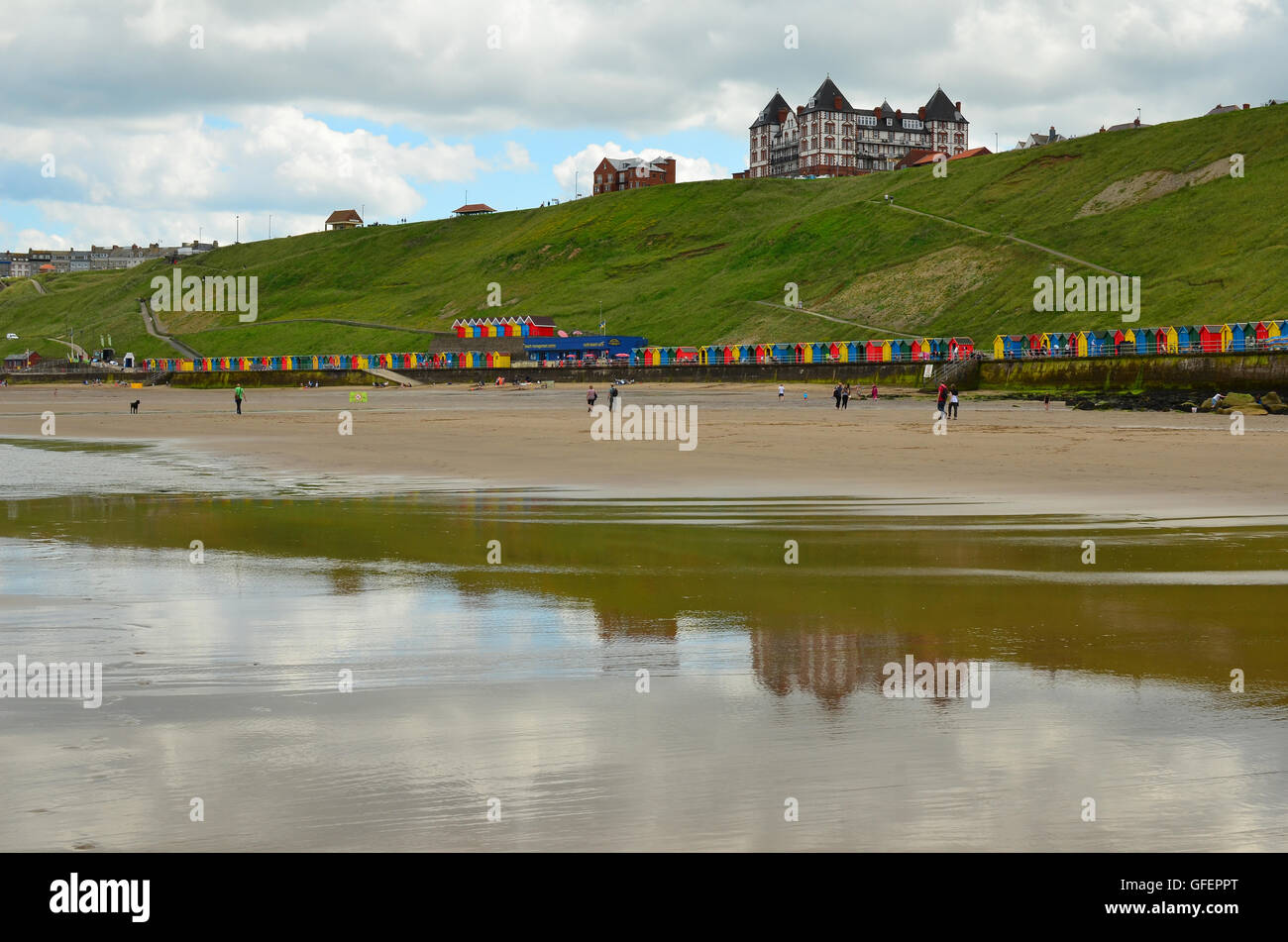 View of Whitby beach with hotels in the background Stock Photo - Alamy