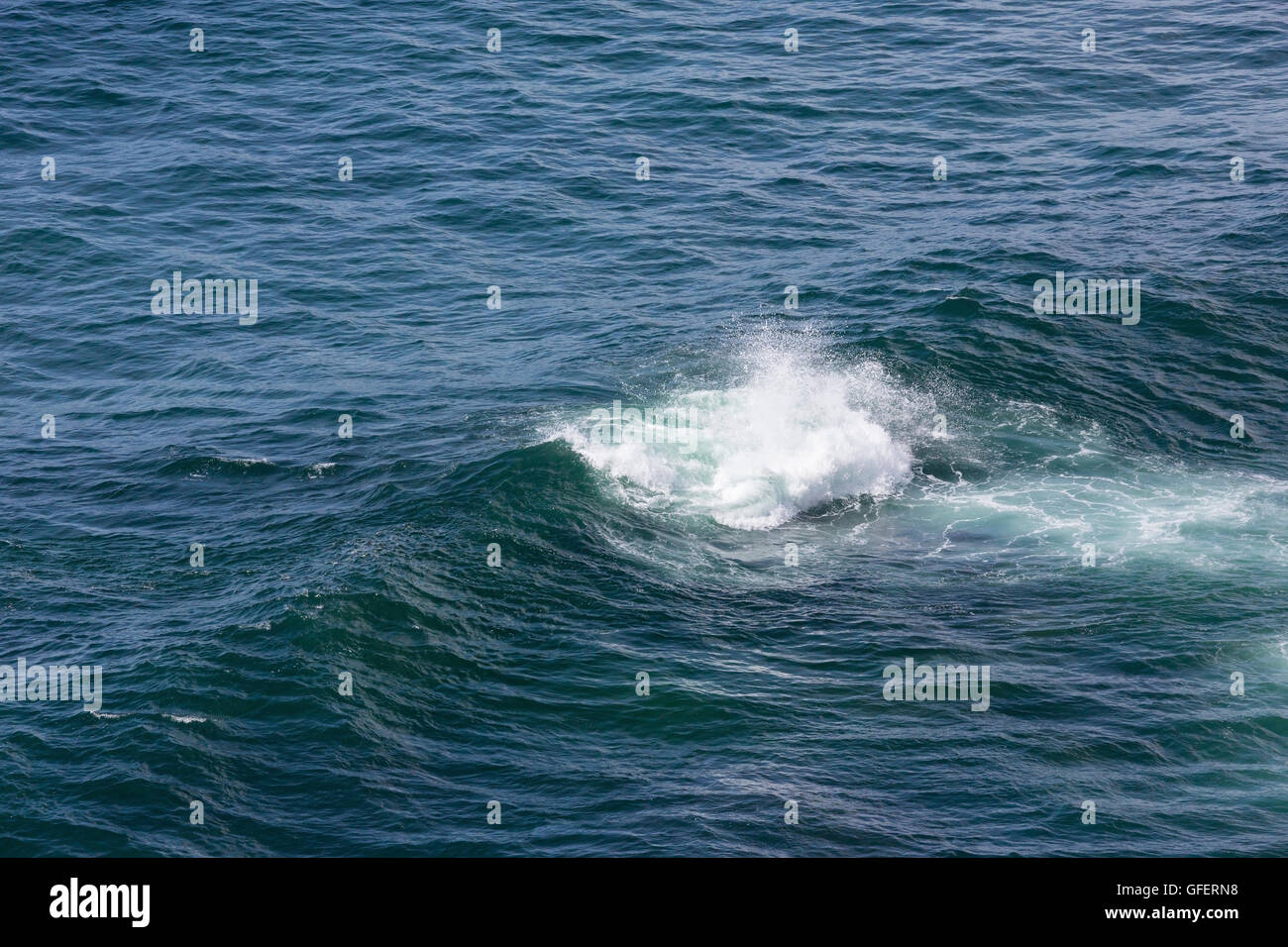 Sea wave with foam. Top view from shore Stock Photo - Alamy