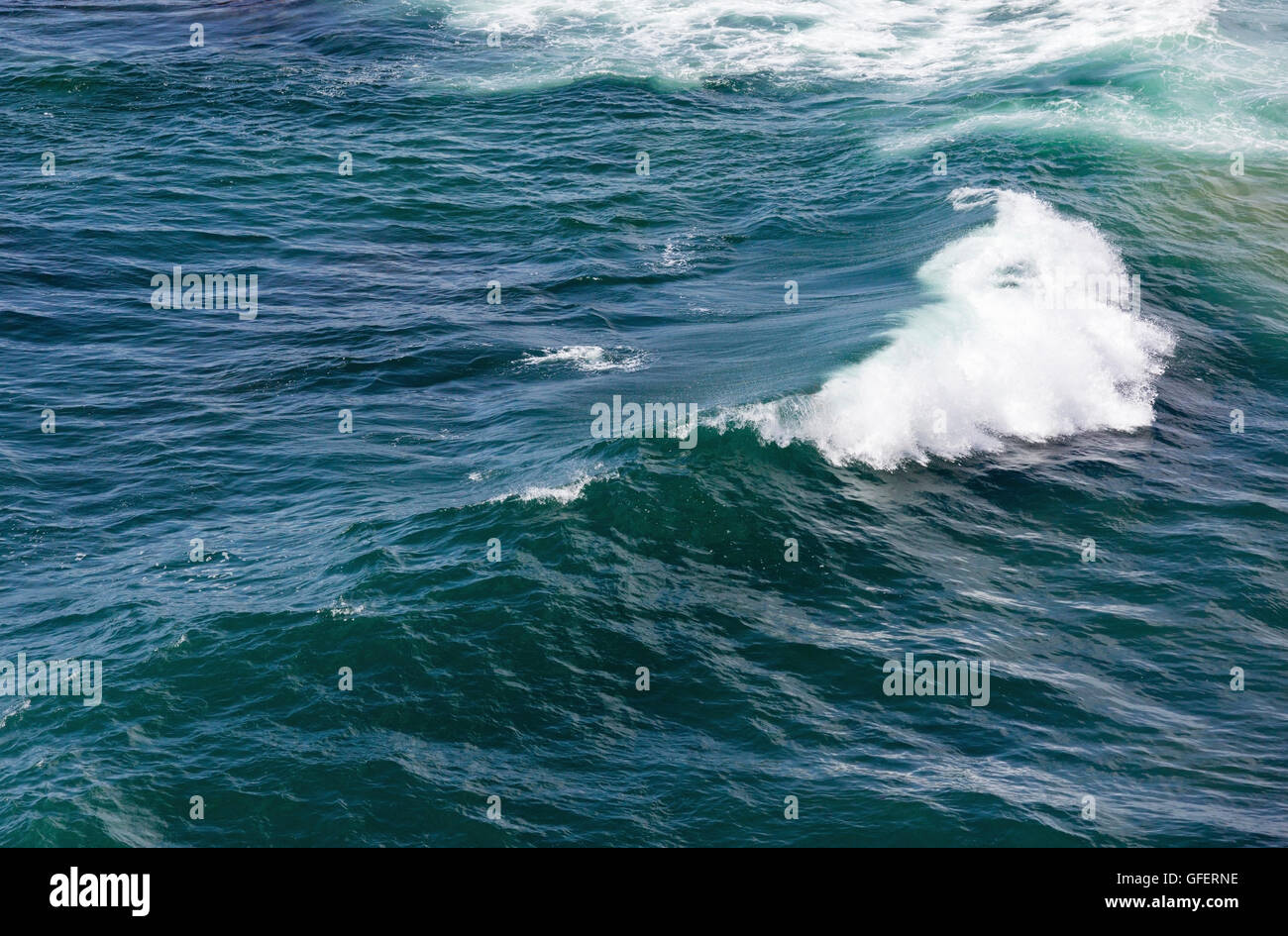 Sea wave with foam. Top view from shore Stock Photo - Alamy