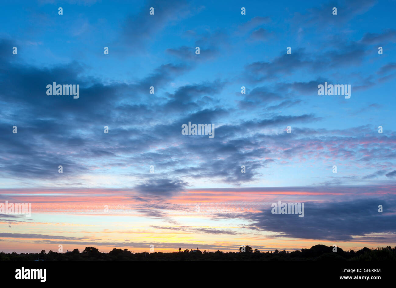 Sunset with clouds illuminated by evening sun. Nature background Stock ...