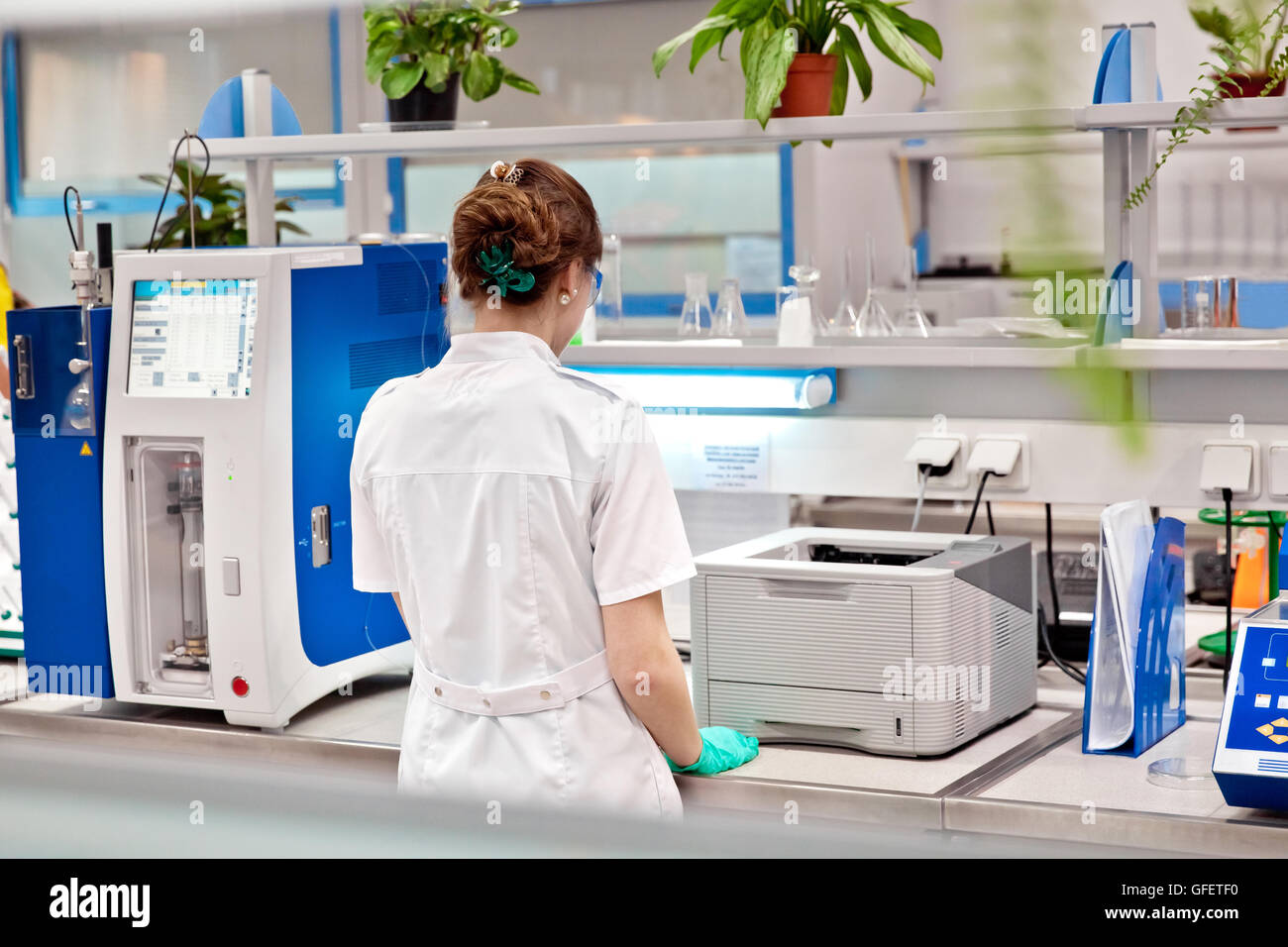 Girl in laboratory Stock Photo - Alamy