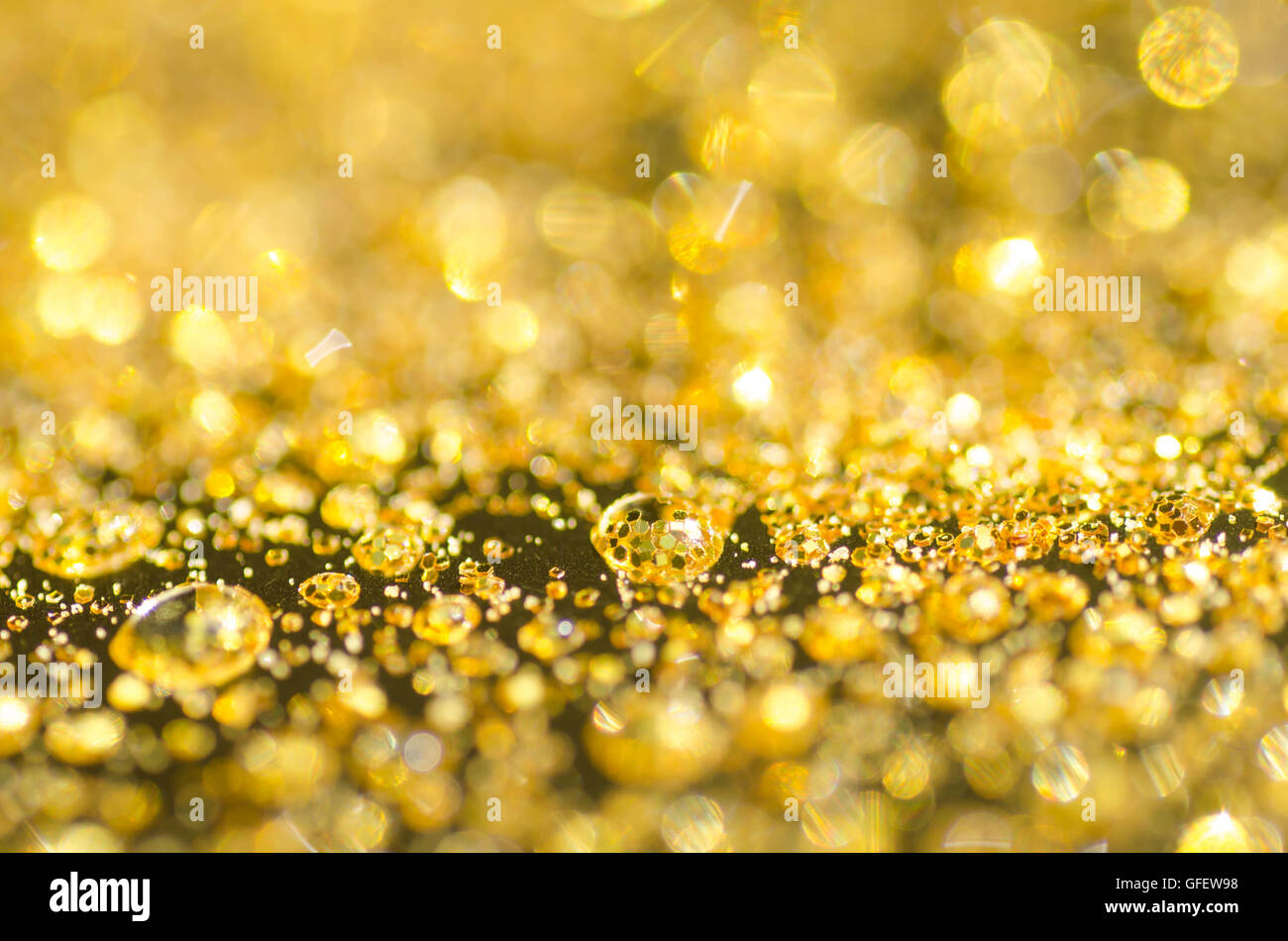 metallic golden drops background texture Stock Photo - Alamy