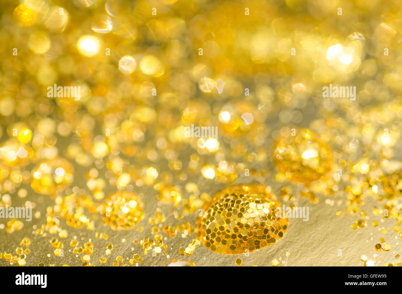 metallic golden drops background texture Stock Photo - Alamy