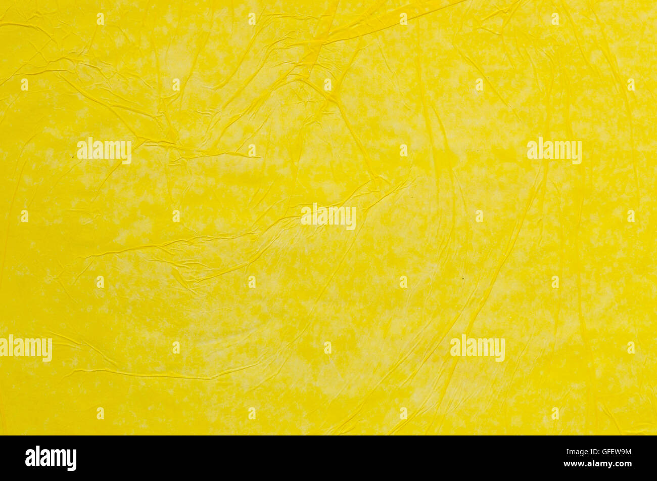 creased yellow tissue paper background texture Stock Photo - Alamy