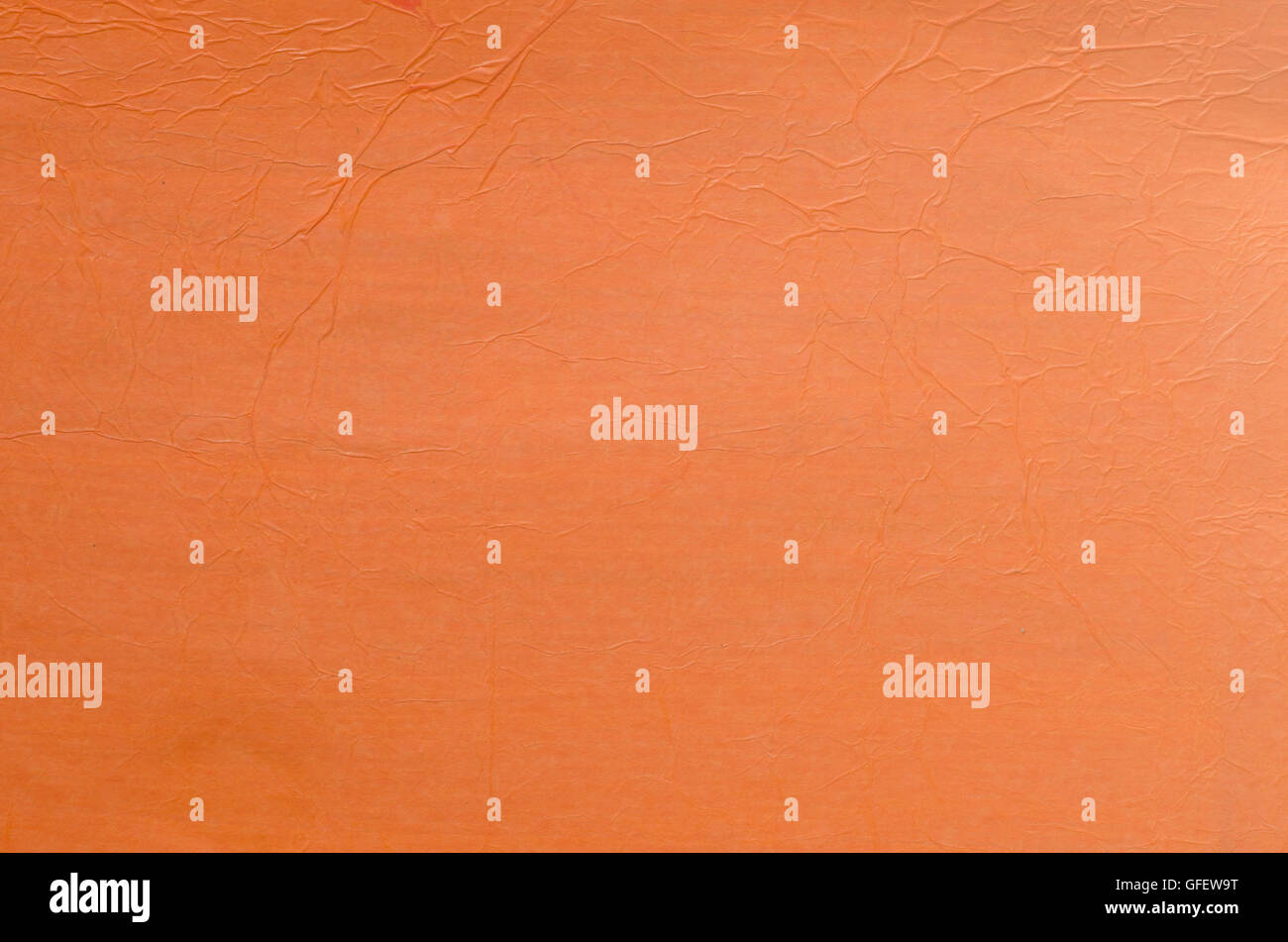 creased orange tissue paper background texture Stock Photo - Alamy