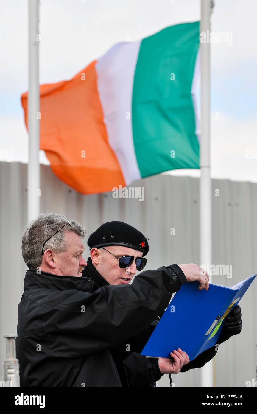 A man wearing Irish republican paramilitary uniform reads from the INLA ...